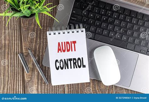 Audit Control Text On A Notebook With Laptop Mouse And Pen Stock