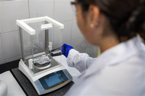 Scientist Weighing A Sample On A Scale Stock Image Image Of