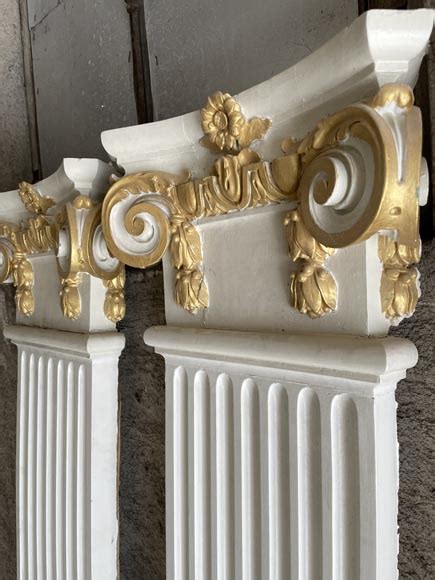 Series Of Ionic Pilasters In Sculpted And Painted Wood Paneled Rooms