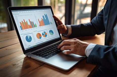 Premium Ai Image A Businessman Working On A Laptop Showing Business