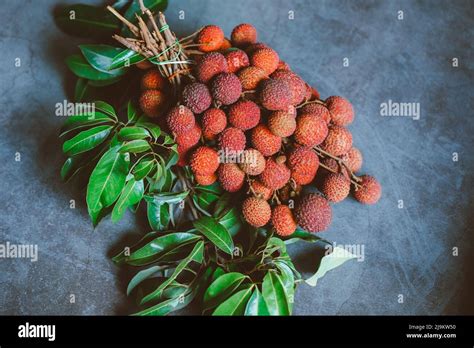 Lychee Fruit With Green Leaf On Black Background Fresh Ripe Lychee