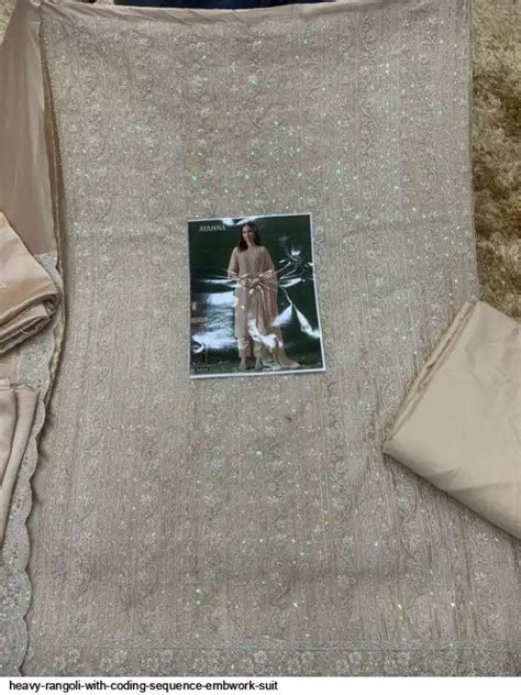 Heavy Rangoli With Coding Sequence Embwork Suit