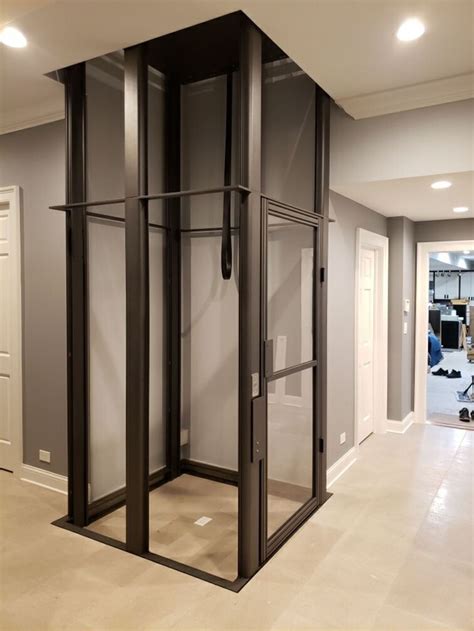 Sunset Ridge Glass Elevator Design