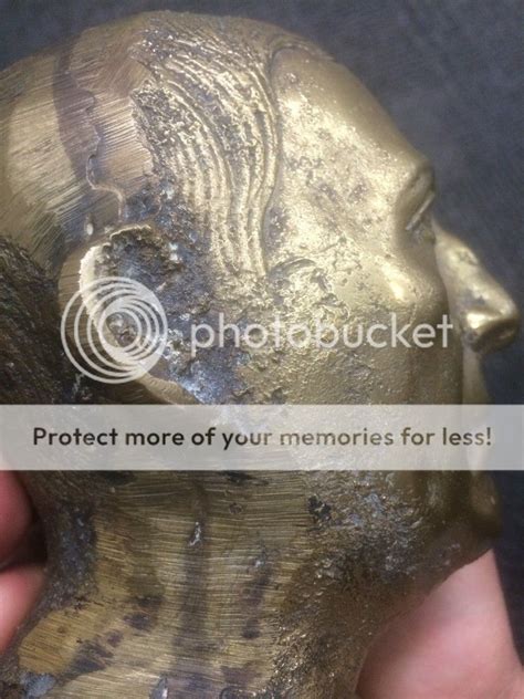 Brass Bust Antiques Board