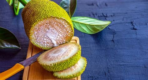 Premium Photo Sliced Fresh Raw Green Jackfruit Reveals The White Pulp