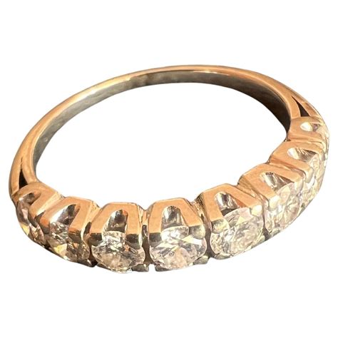 Vintage 18 Karat White Gold Eight Round Cut Diamonds Band Ring For Sale