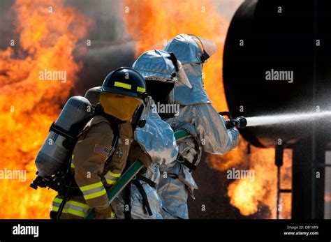 A U S Army Reserve Firefighter Left And Two Mississippi Air National