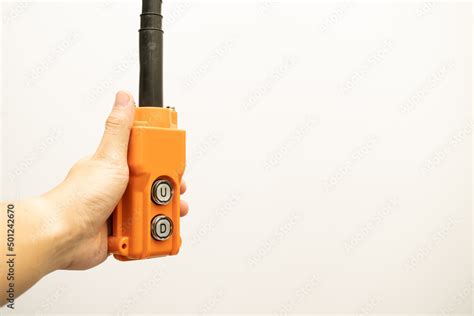 Hoist Push Button Switch In Isolated Hand Holding Overhead Cranes Remote Up Down Hydraulic