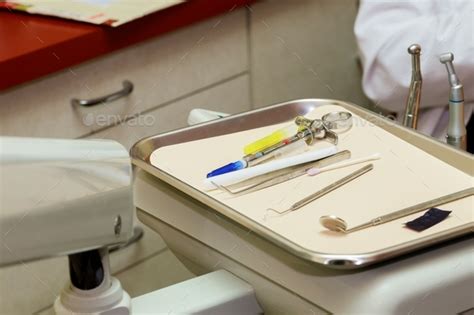 Different Dental Instruments And Tools In A Dentists Office Set