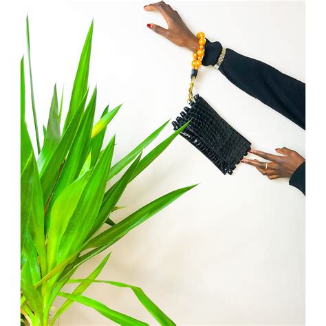 Chiney Bump Clutch Mo Bacchus Accessories