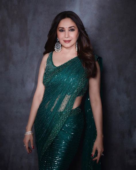 Madhuri Dixit Looks Resplendent In Sequinned Green Saree See Pics