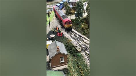 Sandite Rail Head Cleaning Train Passing Through A Steamlined Point