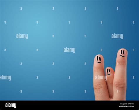 Happy Smiley Face Fingers Looking At Empty Blue Background Copy Space