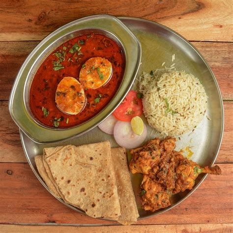 Premium Photo Chicken Thali From An Indian Cuisine Food Platter