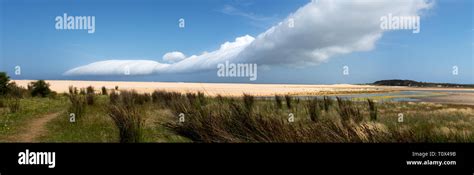 A Dramatic Coastal Volutus Storm Cloud A Low Horizontal Tube Shaped Type Of Arcus Cloud Also