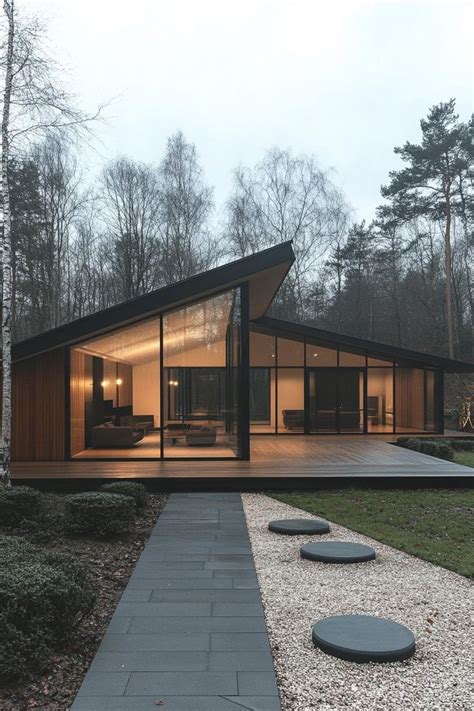 Modern Glass House With Sleek Design Nestled In A Forest Setting Here