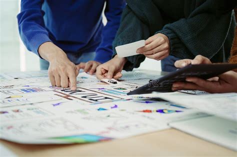 Team Of Creative Web Graphic Designer Planning For Mobile Phone