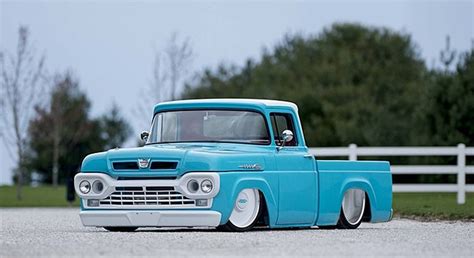 Classic Blue Ford Truck Parked Next To White Fence 1959 Ford Pickup Trucks 1960 Ford F100