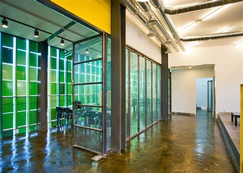 Jya Rchitects Clads Restaurant Facade In Rotating Green Panels