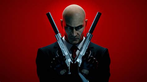 Download Hitman Hd Agent 47 Guns Crossed Wallpaper