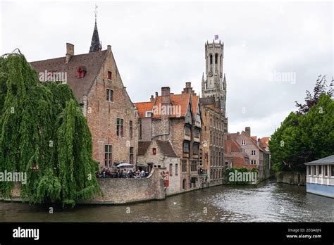 Medieval Buildings On The Dijver Canal With The Belfry Bell Tower Seen