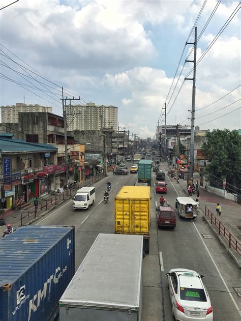 View From The Footbridge Of Pio Valenzuela St And The Ah26 Macarthur