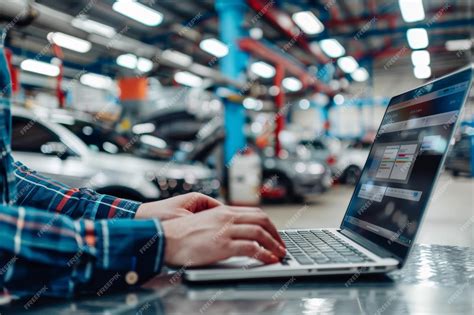 Browsing Online Auto Parts Catalog on Laptop in Garage for Efficient Car Maintenance | Premium ...