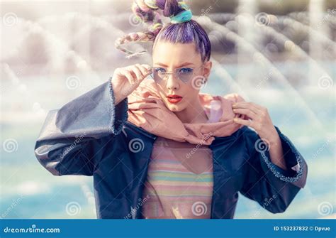 Outdoor Close Up Portrait Of A Young Lady With Crazy Look Fashionable