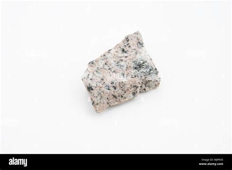 Extreme Close Up With A Lot Of Details Of Syenite Rock Isolated Over