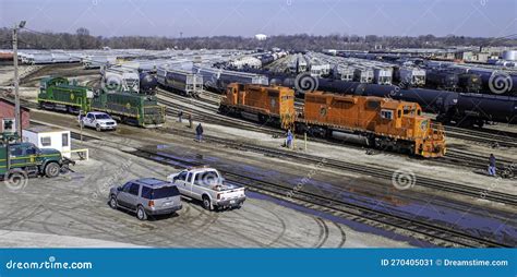 A Railroad Classification Yard Is Filled With Freight Cars Switcher And
