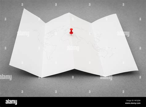 Paper Folded World Map With Red Pin Pointer Stock Photo Alamy