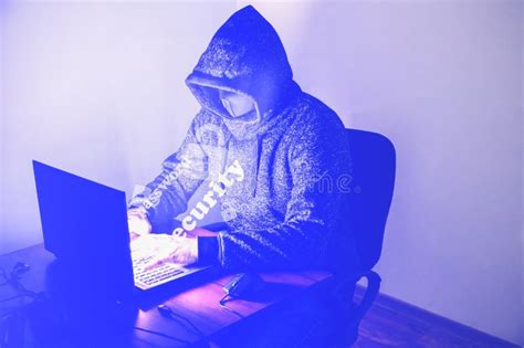 man in hoodie is hacking personal data information security