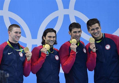 Team Usa Gold Medalists Ryan Held Anthony Irvin Michael Phelps And
