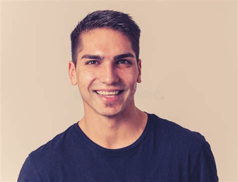 Portrait Of Attractive Cheerful Young Man With Smiling Happy Face
