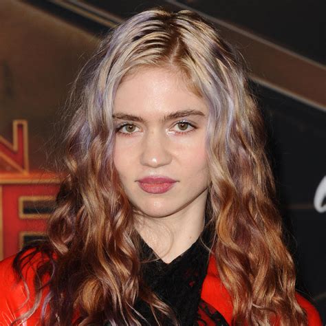 Grimes Blasts Elon Musk For Bringing Their Son To Oval Office Press