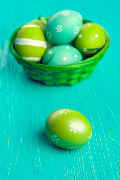 Premium Photo Green Easter Eggs On Wooden Table