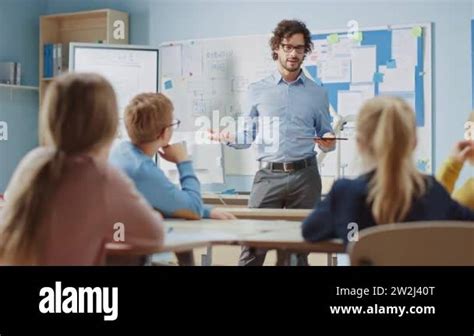 Elementary School Physics Teacher Uses Interactive Digital Tablet To