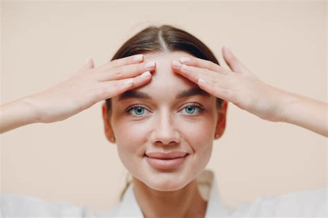 Premium Photo Portrait Of Young Woman Against Colored Background