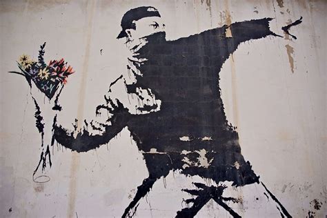 Love Is In The Air Flower Thrower By Banksy Meaning Analysis