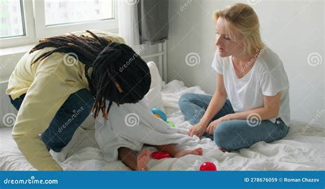 African Daddy And Caucasian Mommy Putting Towel On Babby Stock Video Video Of Love Room