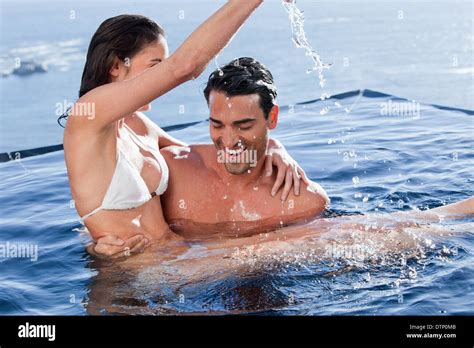Man Holding His Playful Wife Stock Photo Alamy