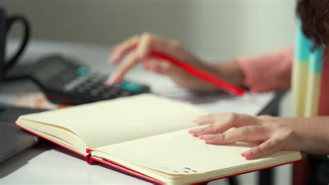 Close Up Of Female Hands Using A Calculator Stock Video At Vecteezy