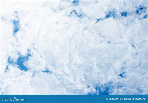 Blue Sky Scenery With White Fluffy Clouds For The Background Stock