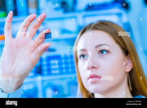 A Lab On Chip Is Device Integrates Several Laboratory Processes In One Device In Woman Hand
