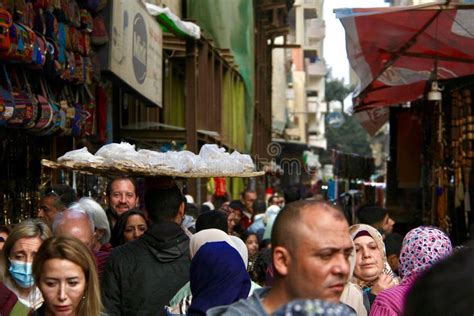 Of The Streets Of The Cairoand X27s Market And A Guy With A Basket Selling Typical Bread