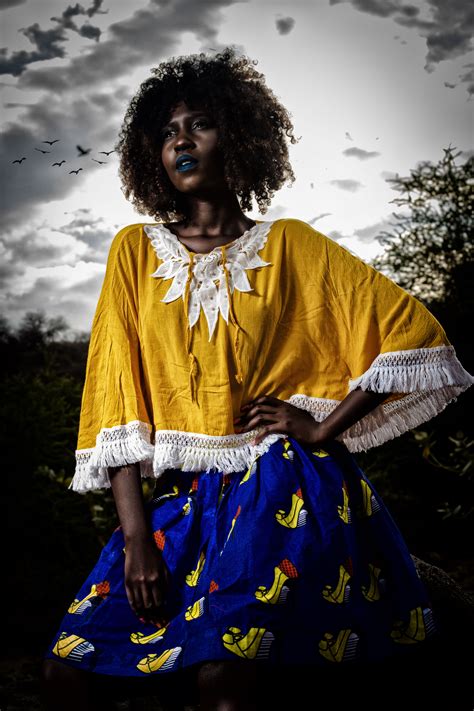 Dark Skinned Beauty In Yellow And Blue Yellow And Dark Blue Outfit