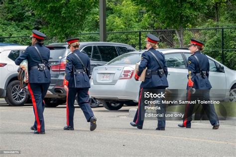 Calgary Women Police Officers Wearing Uniforms Walking On The Street