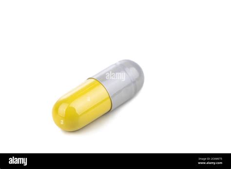 Close Up Of Medicine Drug In Capsule Format On White Background Stock