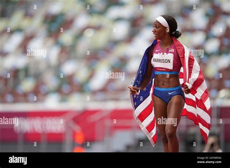 Keni Harrison With Her Countrys Flag After Winning The Silver Medal At