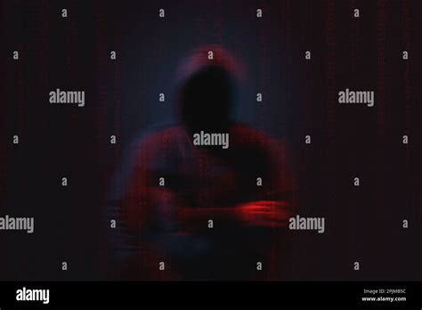 Silhouette Of Anonymous Hacker And Digital Binary Code On Dark Background Cyber Attack Concept